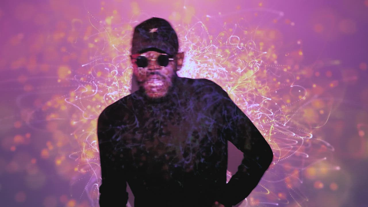 Lights projected onto dancing man - Free Stock Video