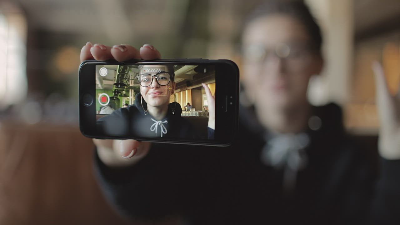Blogger recording himself with his cell phone - Free Stock Video