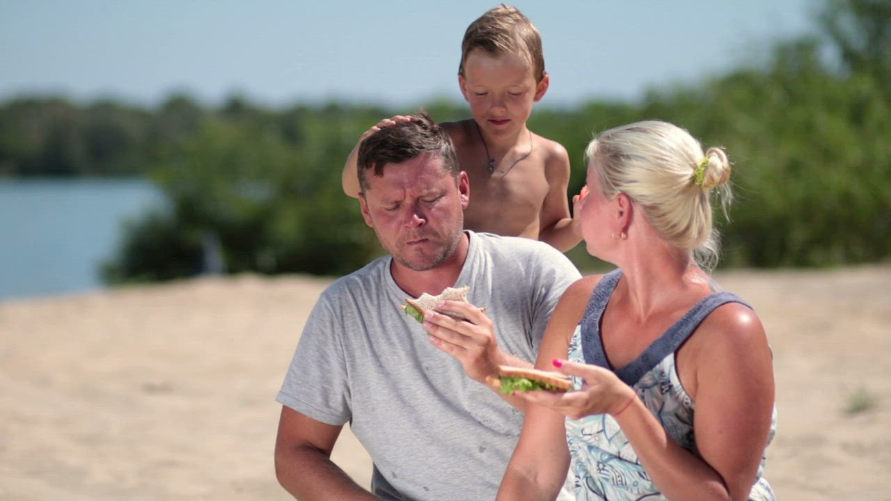 Agitated Dad at the beach - Free Stock Video