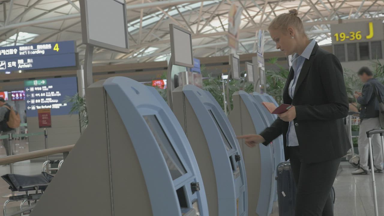 Using a self service machine - Free Stock Video