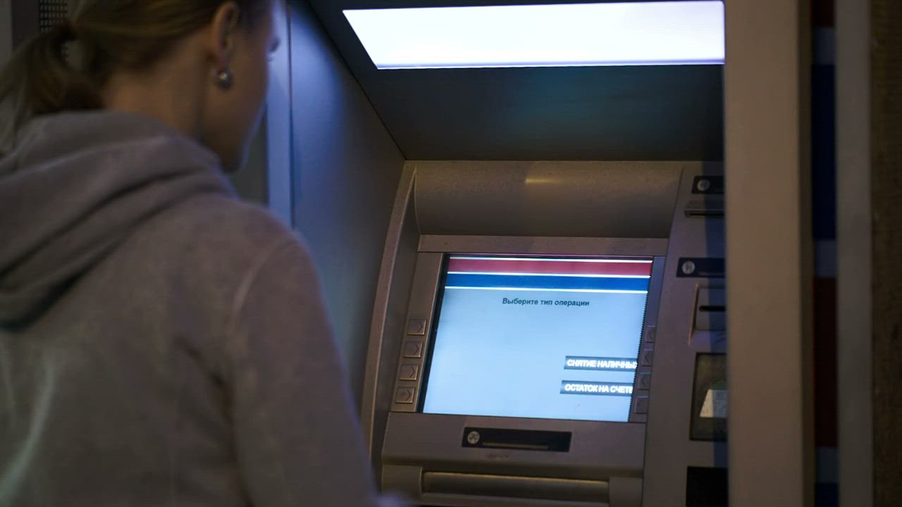 Using an ATM machine - Free Stock Video