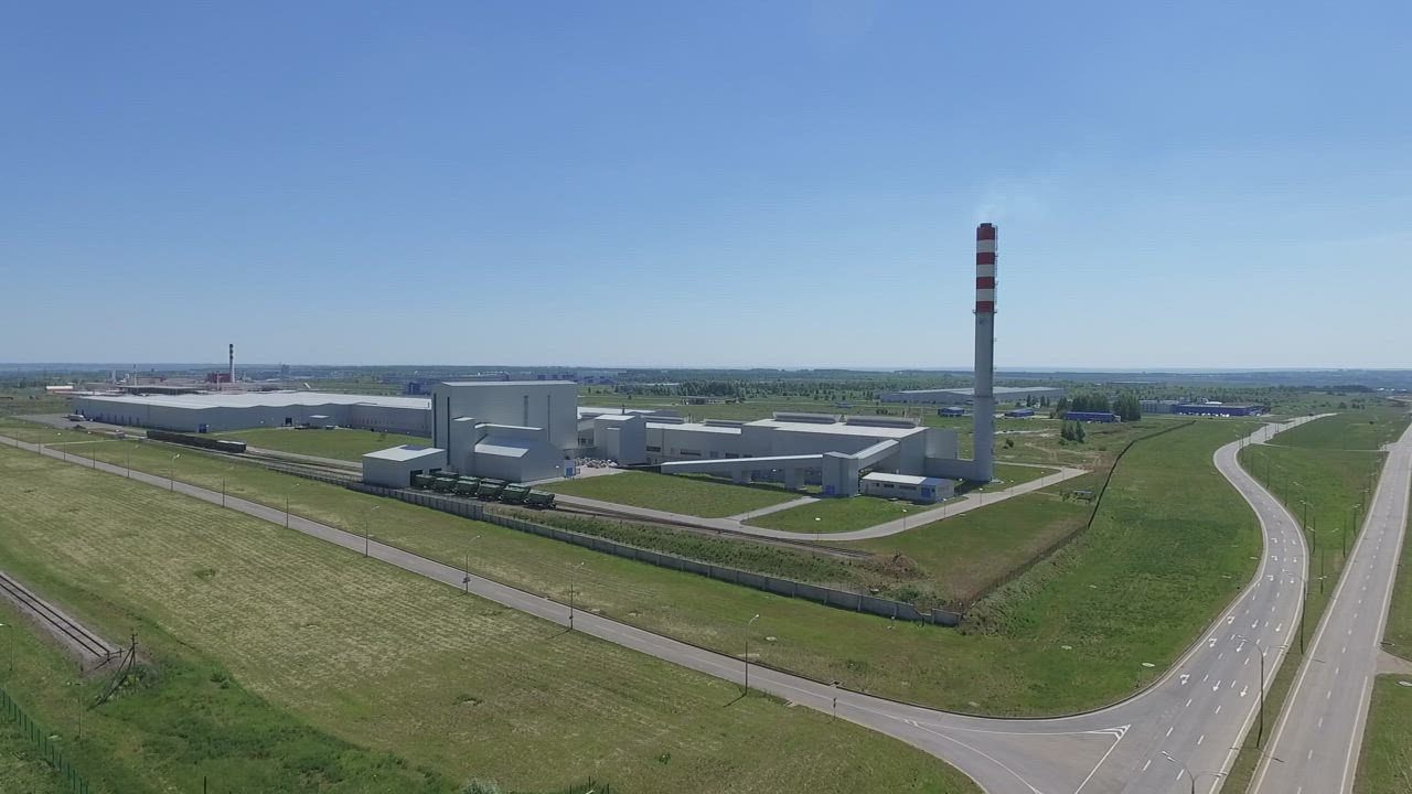 Railway by a factory - Free Stock Video