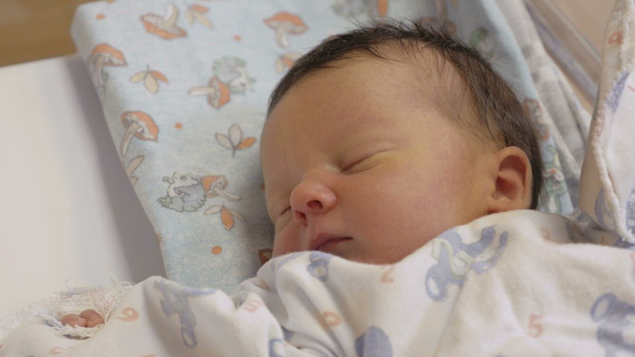 Newborn baby waking up - Free Stock Video