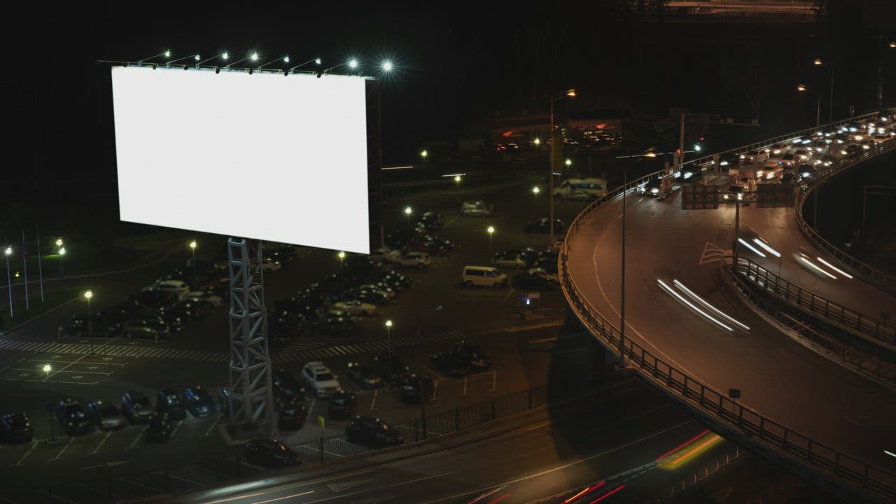 Billboard by a highway - Free Stock Video