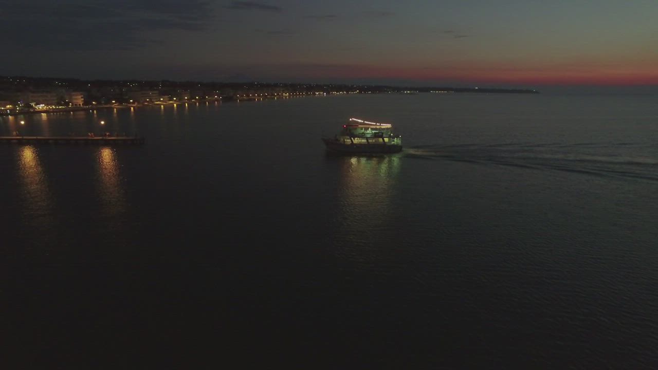 Tour boat with bright lights - Free Stock Video