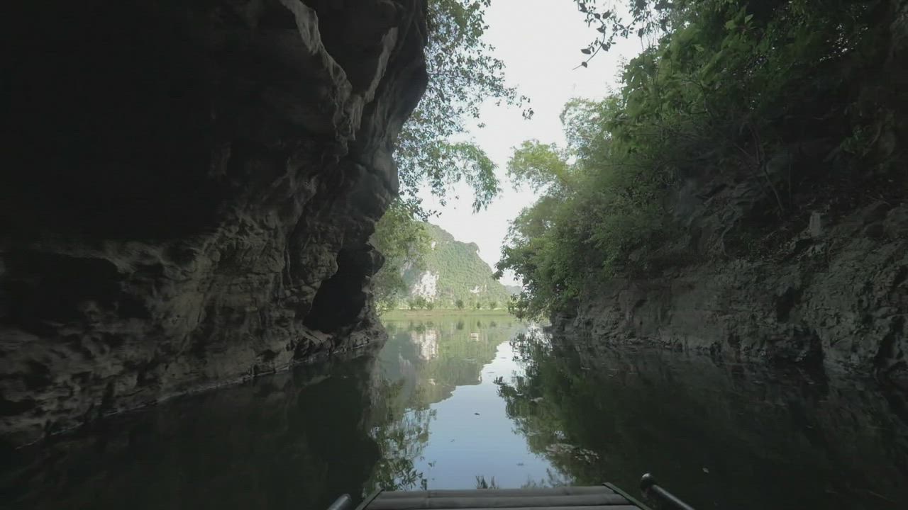 Limestone cliffs over a river - Free Stock Video