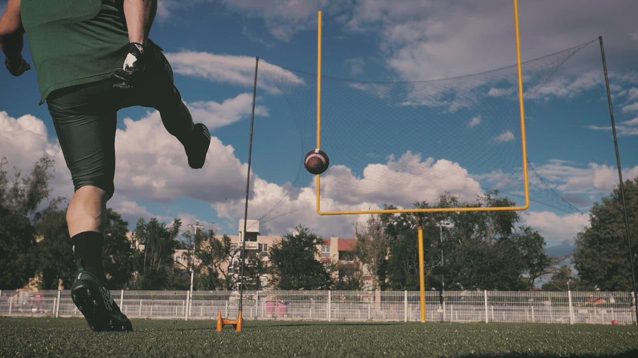 Football player scoring a field goal - Free Stock Video
