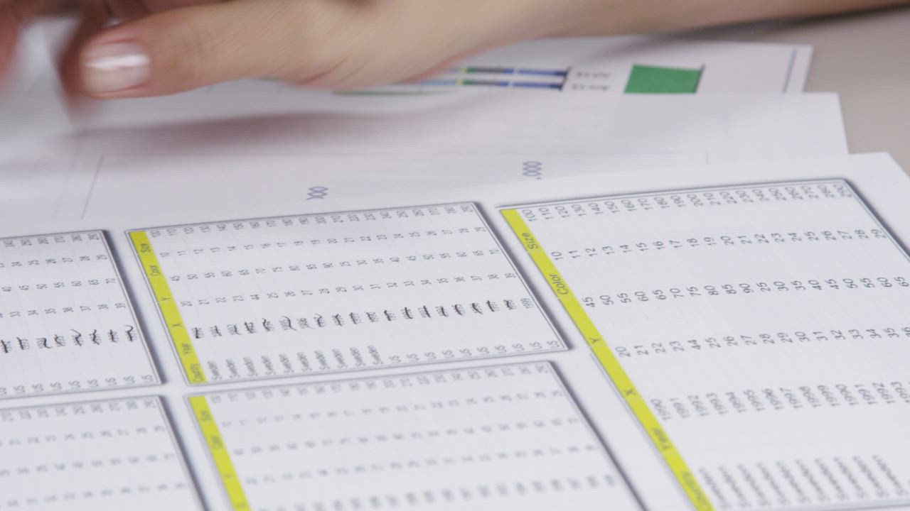 Paperwork with a calculator - Free Stock Video