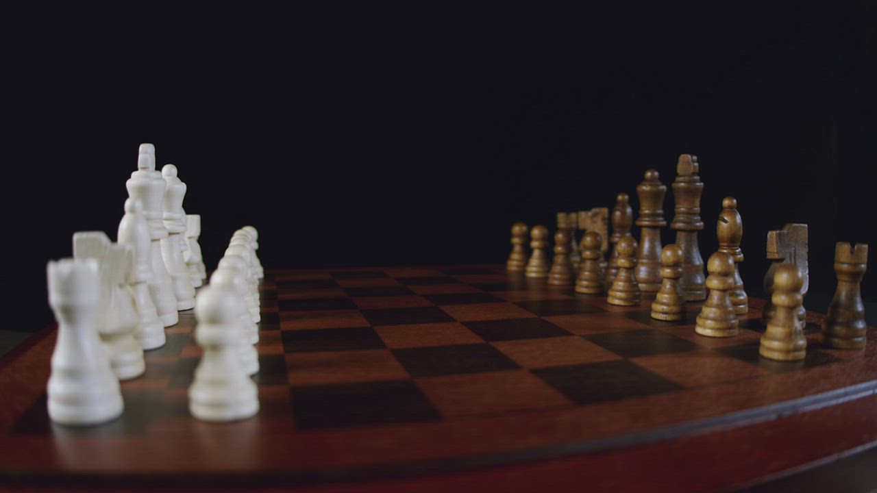 Chess pieces lined up on a board - Free Stock Video