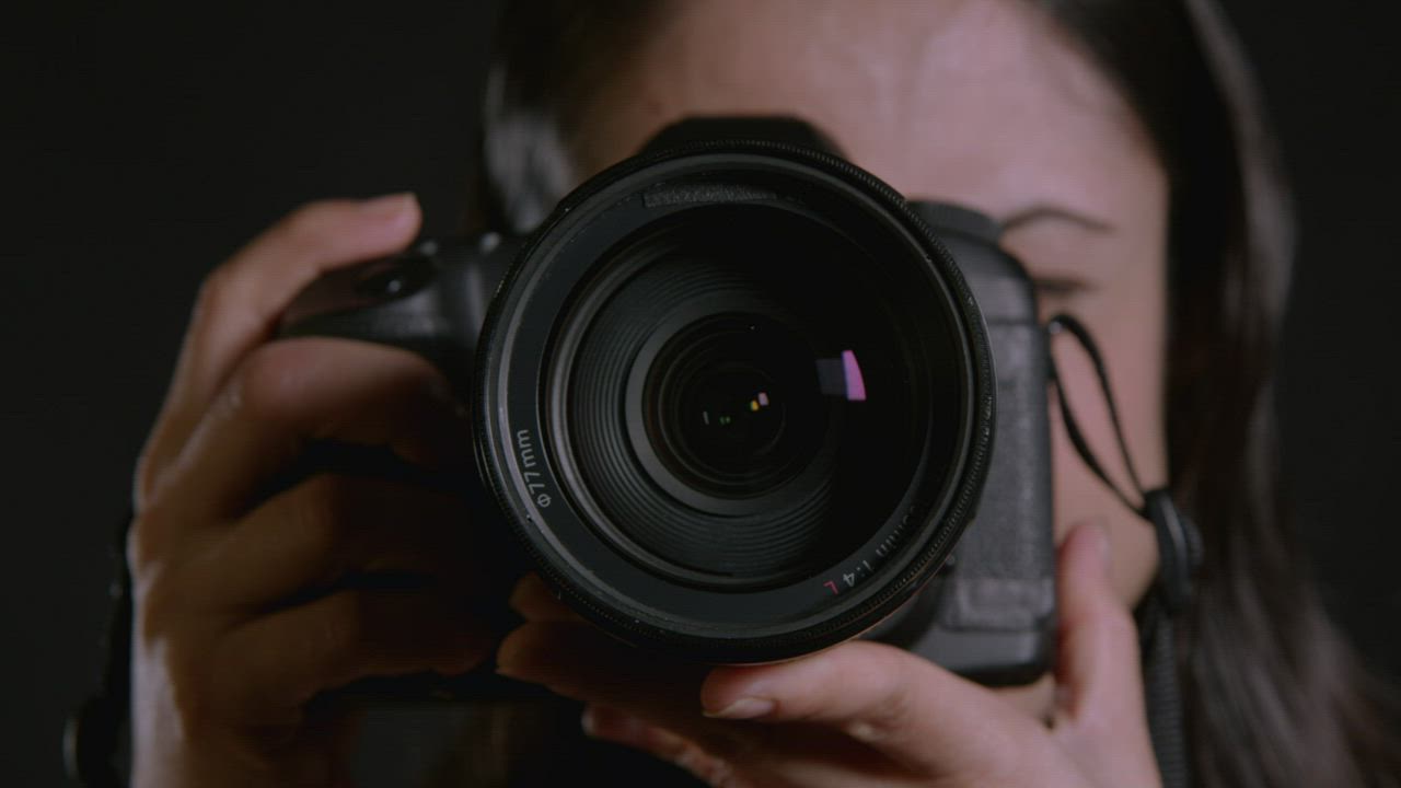 Photographer using a digital camera - Free Stock Video