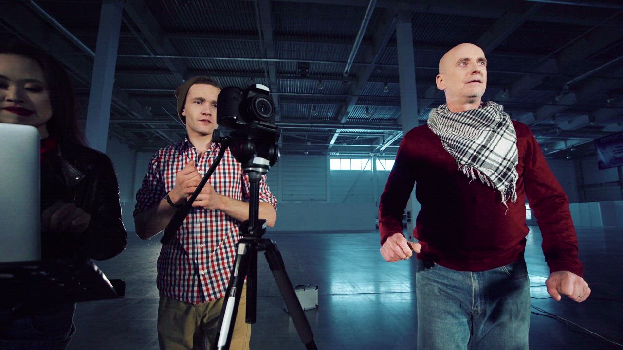 Crew working on a film at warehouse - Free Stock Video