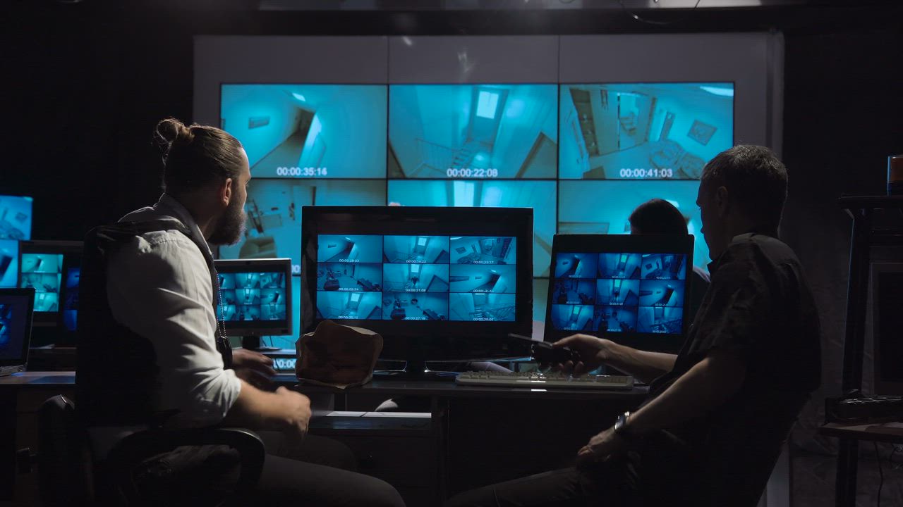 Surveillance team checking the cameras - Free Stock Video