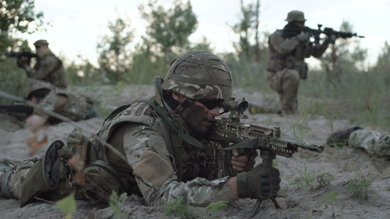 Soldier giving instructions on the field - Free Stock Video