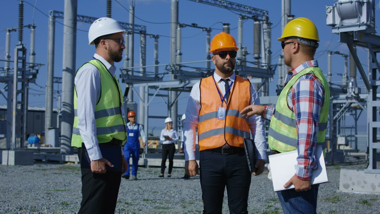 Group of workers in an electrical plant - Free Stock Video