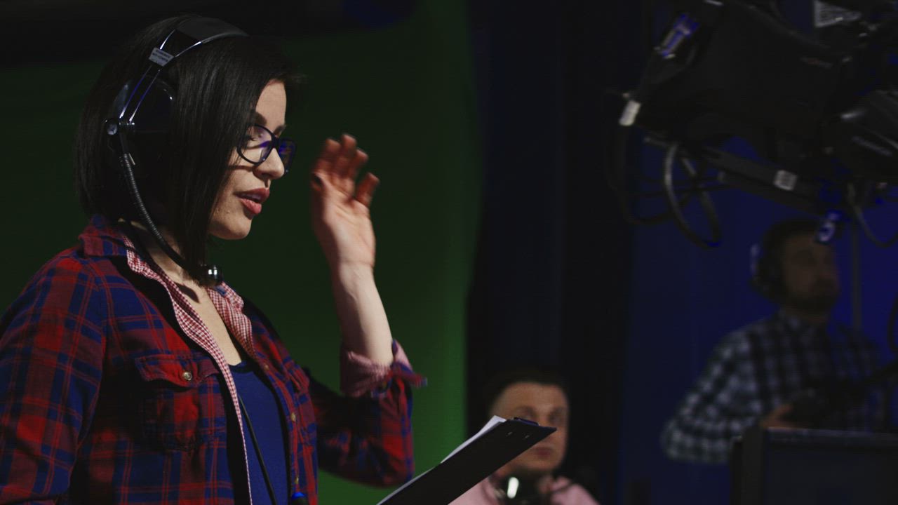 TV manager giving instructions in the set - Free Stock Video