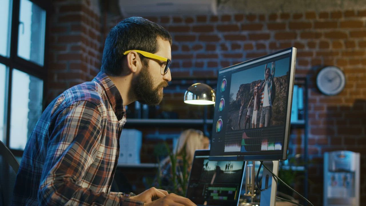 Young man working on video editing - Free Stock Video