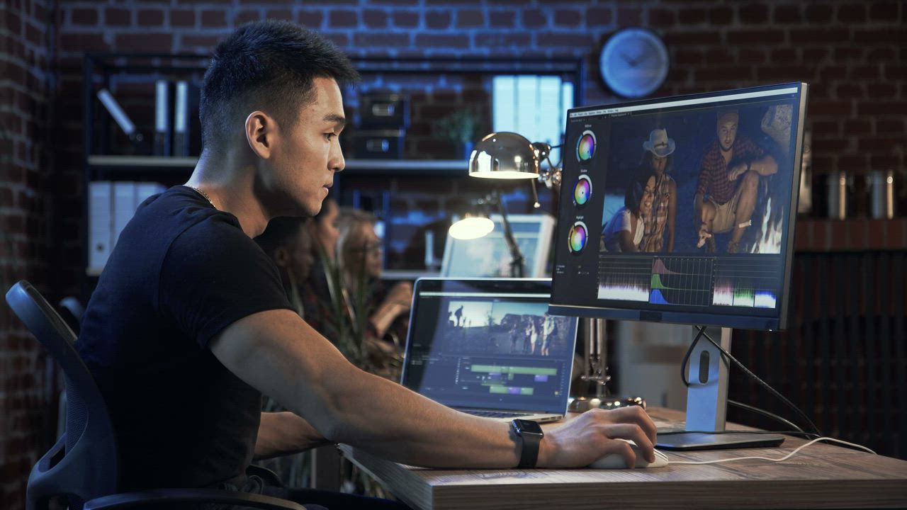 Young man using video editing software - Free Stock Video