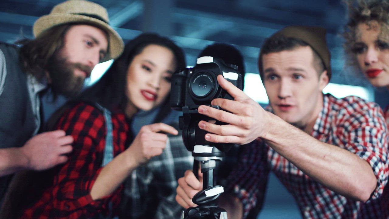 Young people watching display camera - Free Stock Video