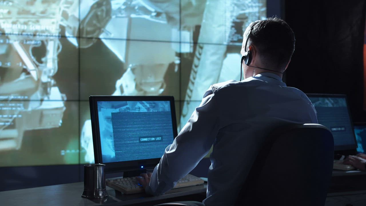 Man in the space station mission control - Free Stock Video