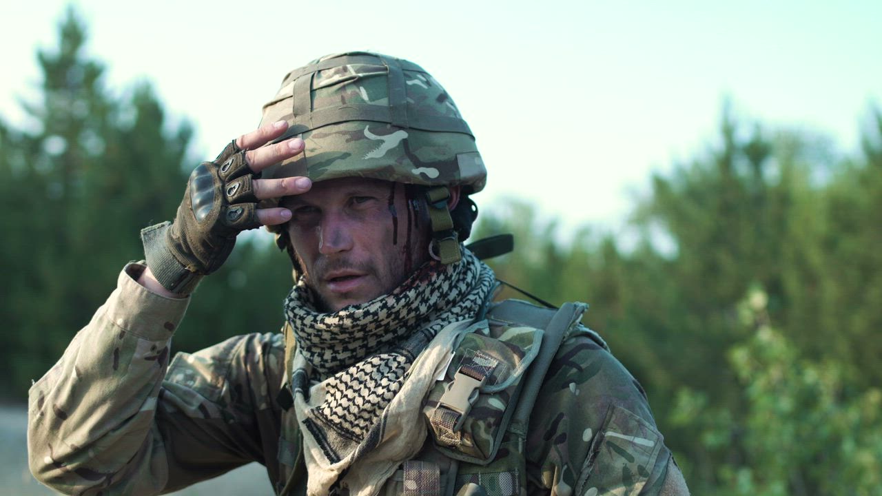 Injured soldier in the sunlight - Free Stock Video