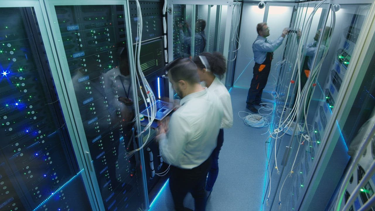 Timelapse of engineers working on data center - Free Stock Video