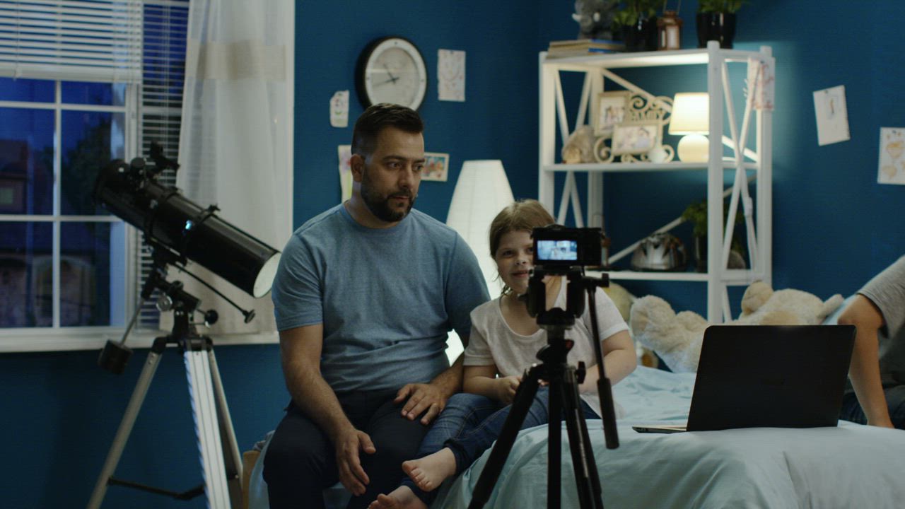 Man with kids making a video at home - Free Stock Video