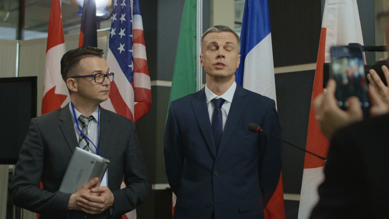 Politician giving an interview to reporters - Free Stock Video