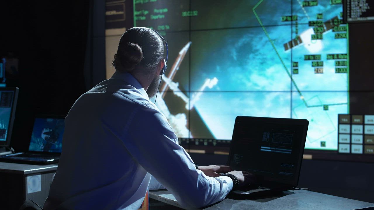 Man working on space center - Free Stock Video