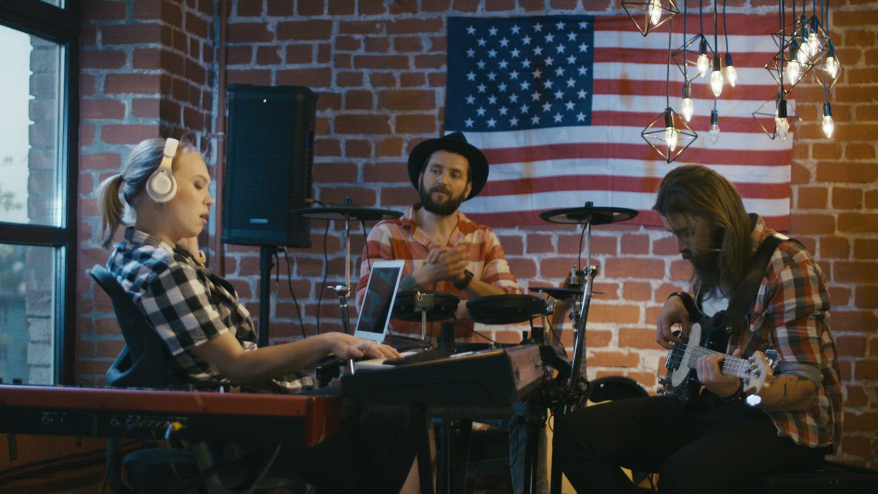 Bored musicians on a rehearsal session - Free Stock Video