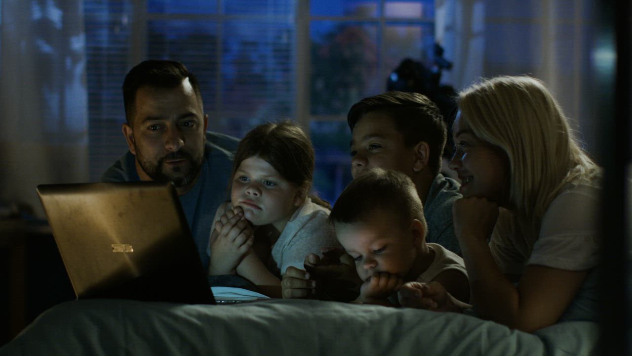 Family watching Netflix on the laptop - Free Stock Video