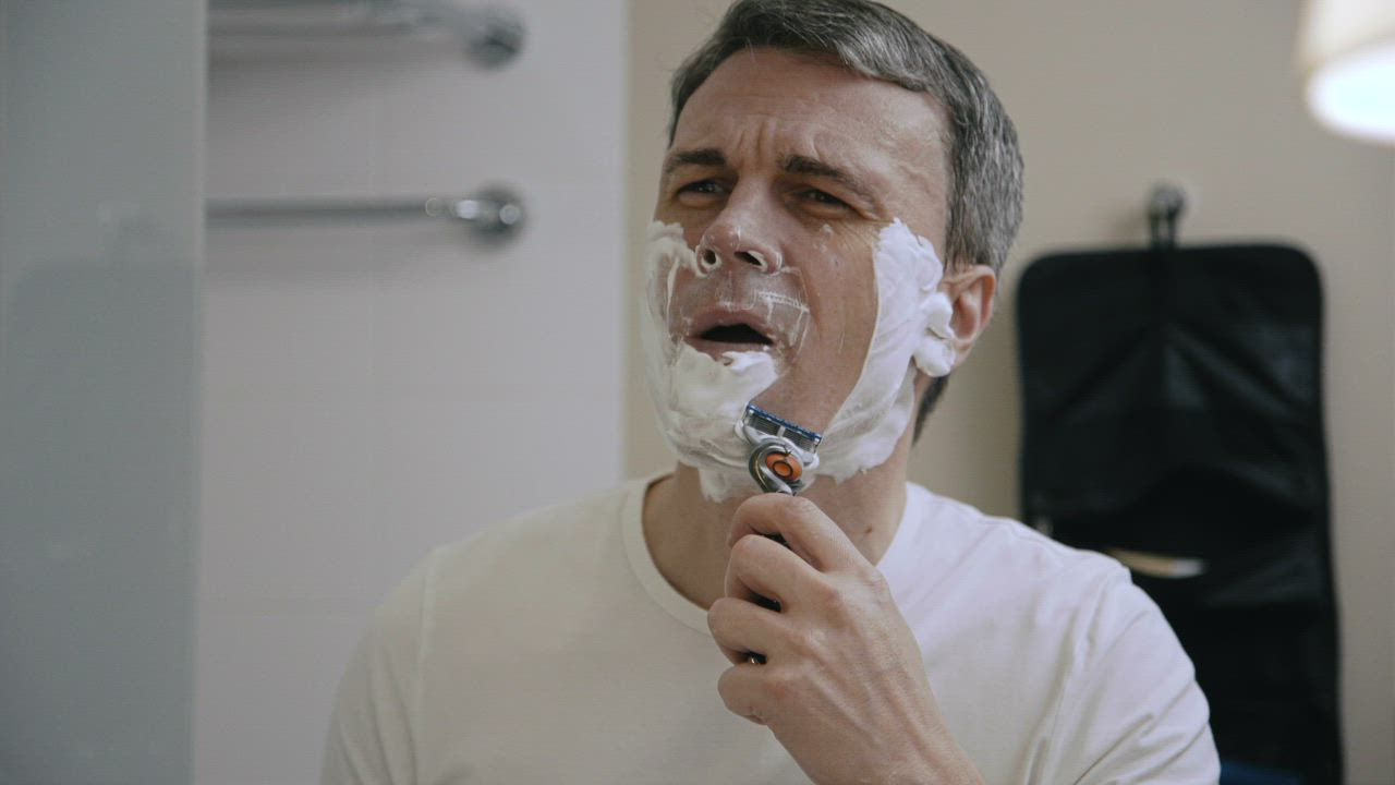A man shaving in the bathroom - Free Stock Video