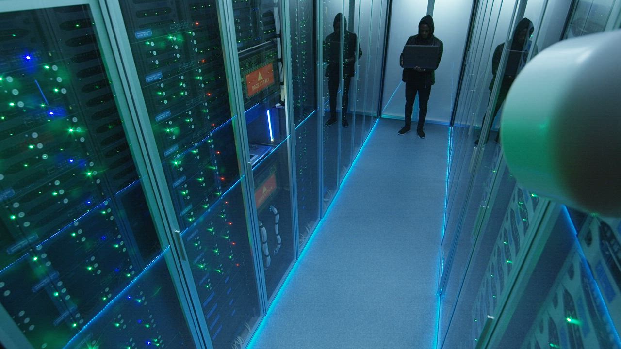 Camera recording hacker entering data center - Free Stock Video
