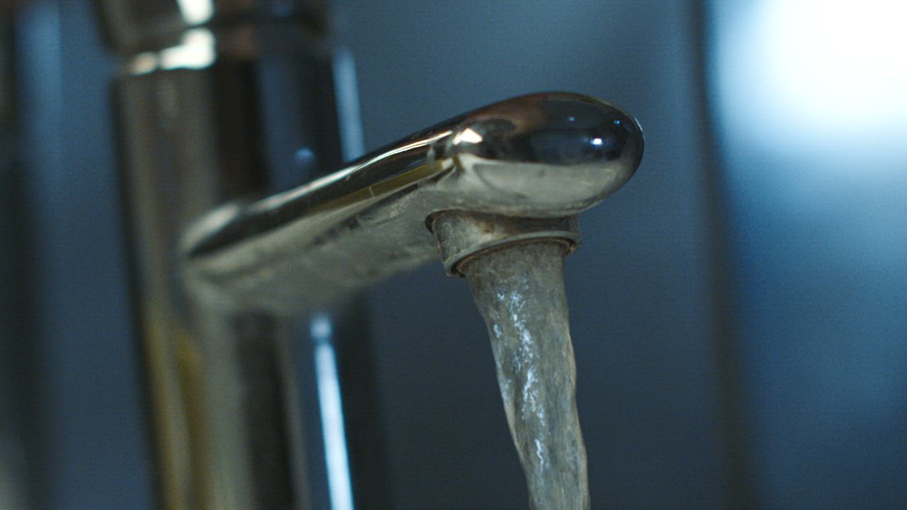 Flowing water from the faucet - Free Stock Video