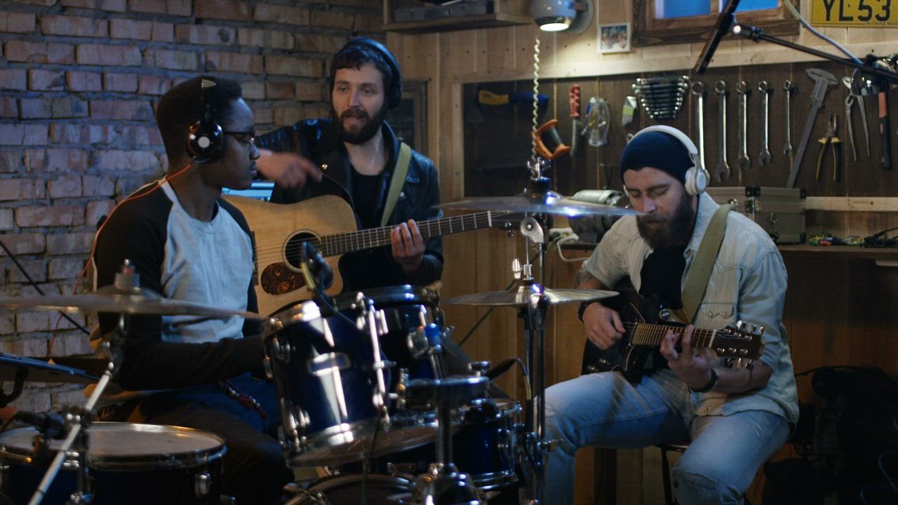 Band rehearsing in the garage - Free Stock Video