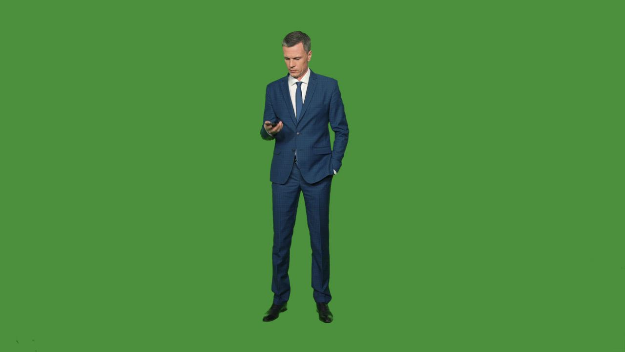 Businessman answering a phone call - Free Stock Video