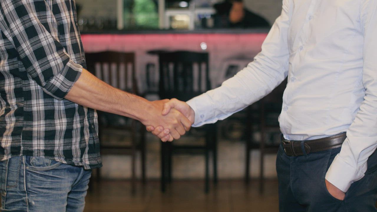 Two different handshakes - Free Stock Video