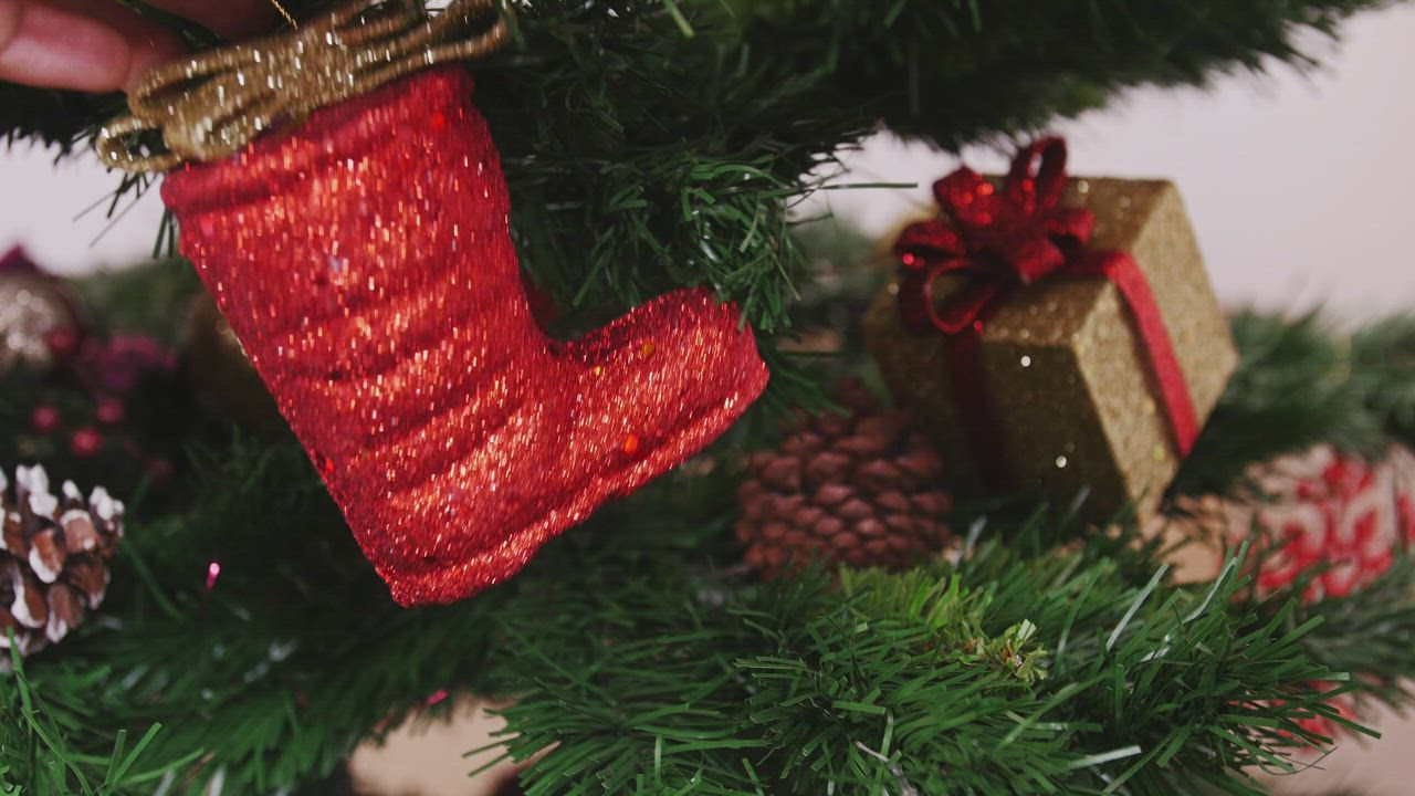 Red boot on a Christmas tree - Free Stock Video