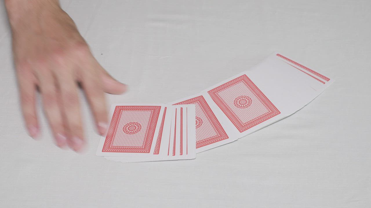 Shuffling a normal deck of cards - Free Stock Video