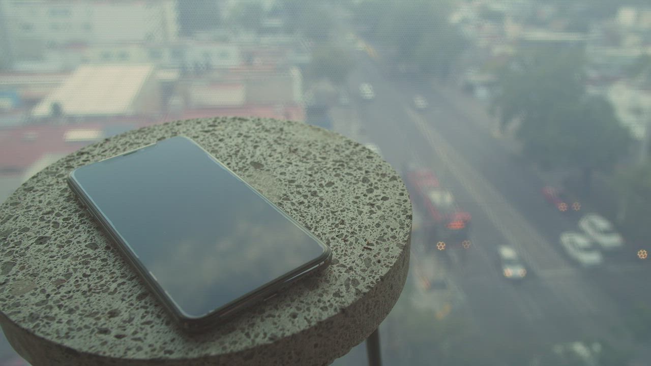 Phone on round end table - Free Stock Video