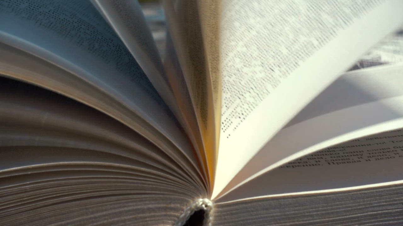 Pages of a book moving in the wind - Free Stock Video