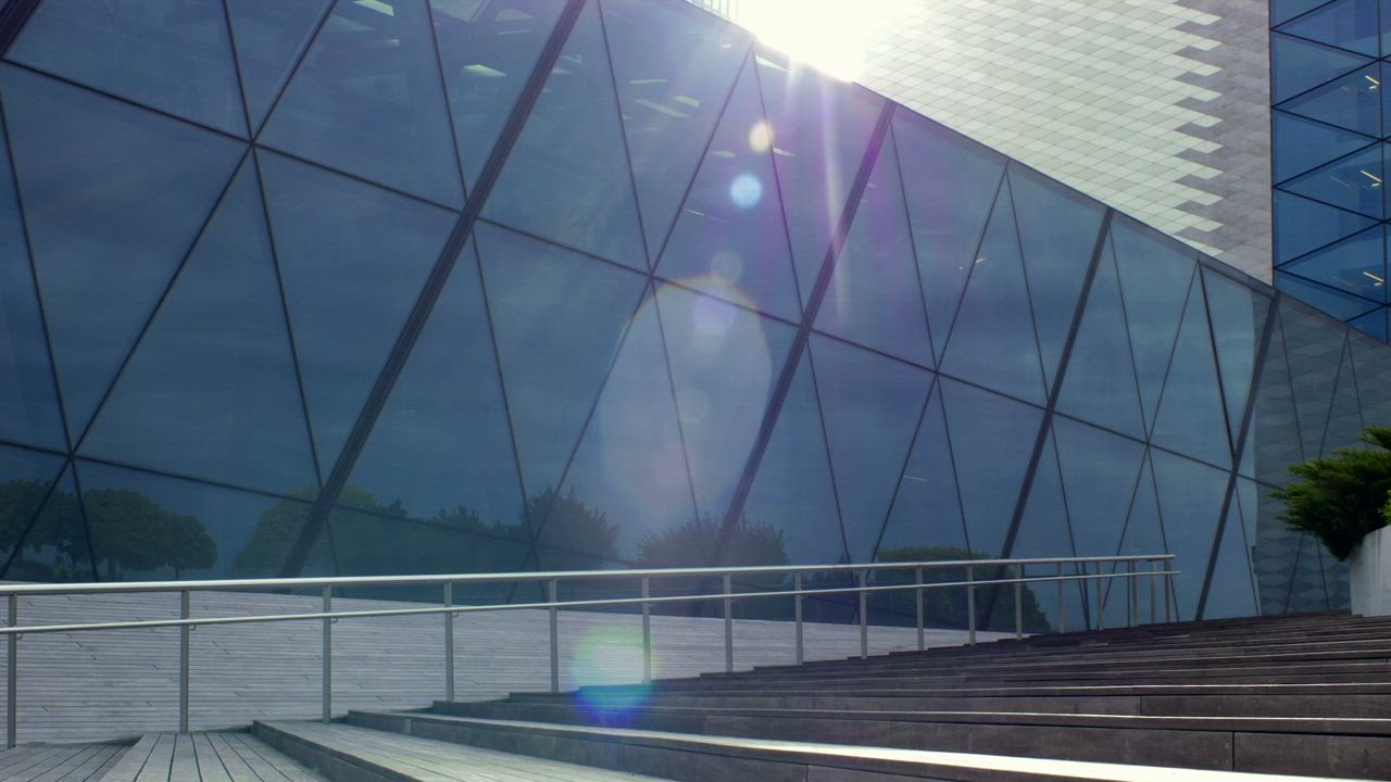 Man walking into office building - Free Stock Video