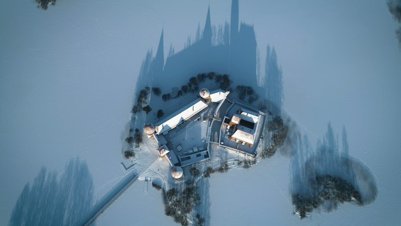 Aerial view of a medieval castle in the winter - Free Stock Video