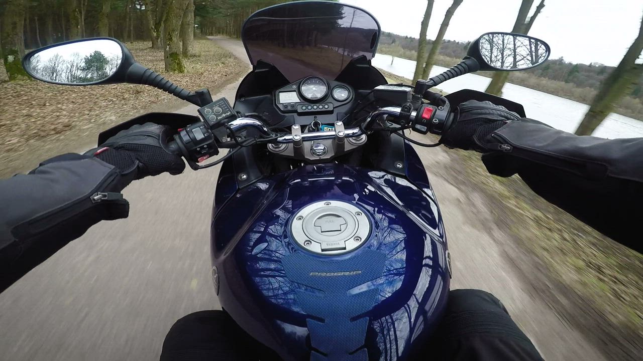 Point of view of riding a motorcycle - Free Stock Video