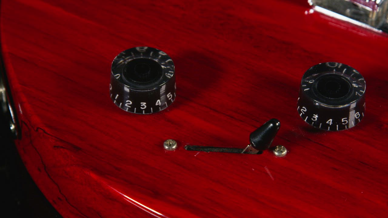 Closeup of a red guitar - Free Stock Video