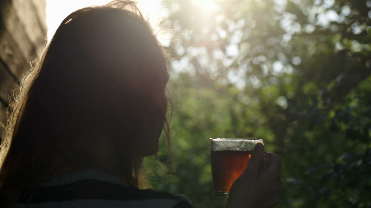 Drinking tea on a cool morning - Free Stock Video