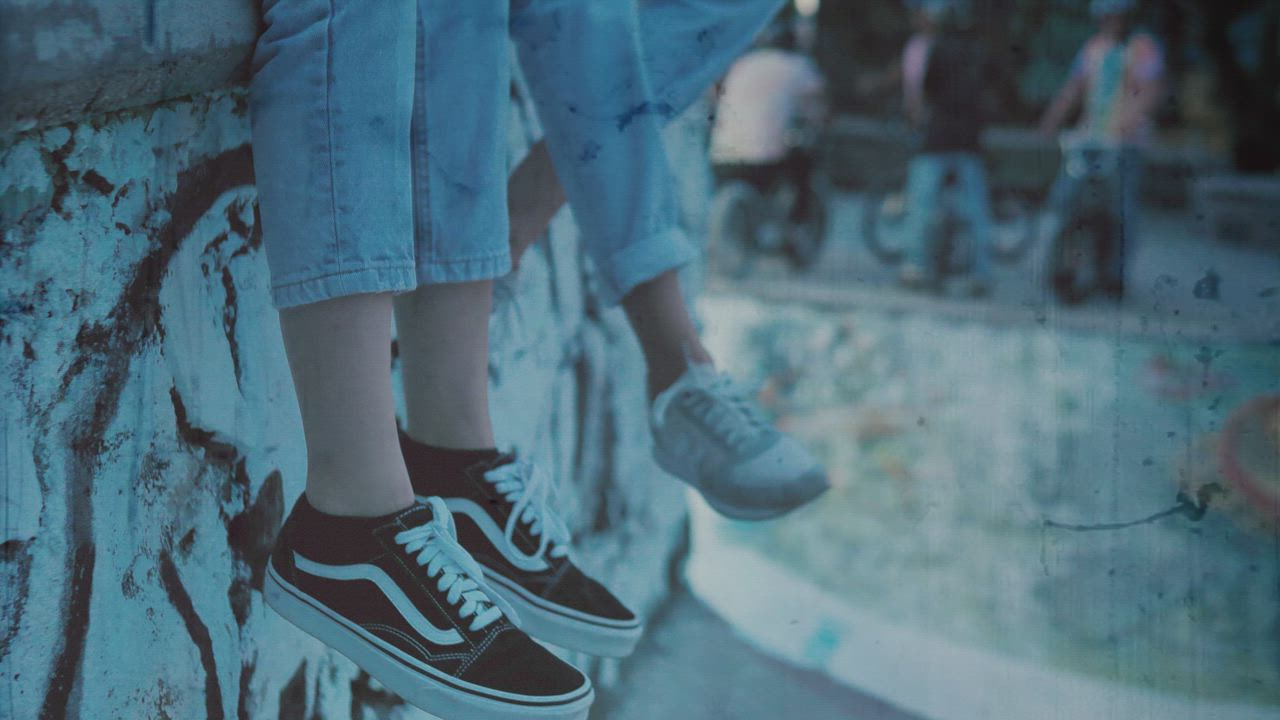 People rocking their feet on a bicycle ramp - Free Stock Video