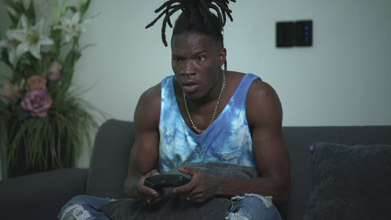 Young man gets upset after losing in a video game - Free Stock Video