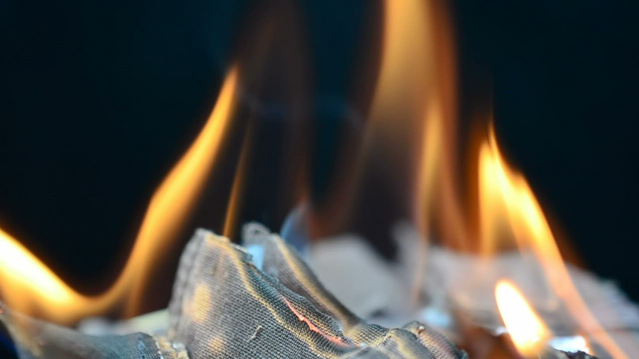 Fabric burning inside - Free Stock Video