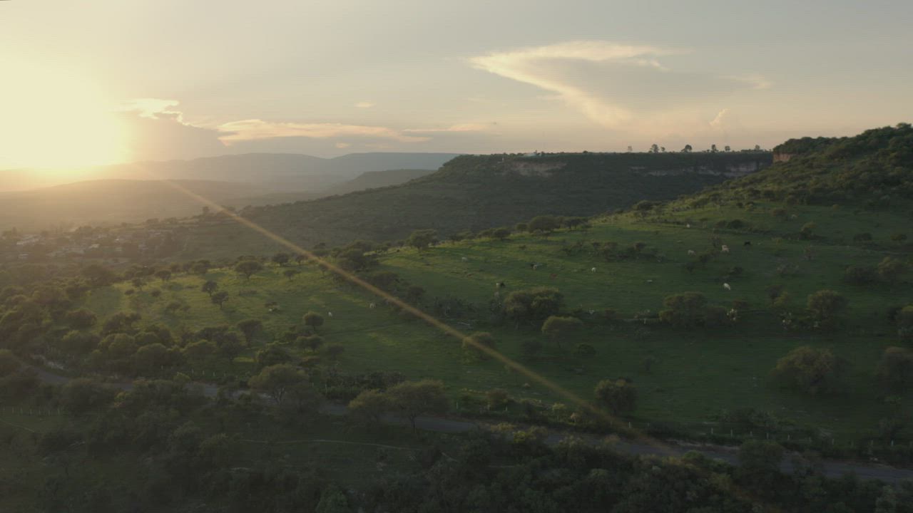 Set of plateaus seen from the heights in a sunset - Free Stock Video