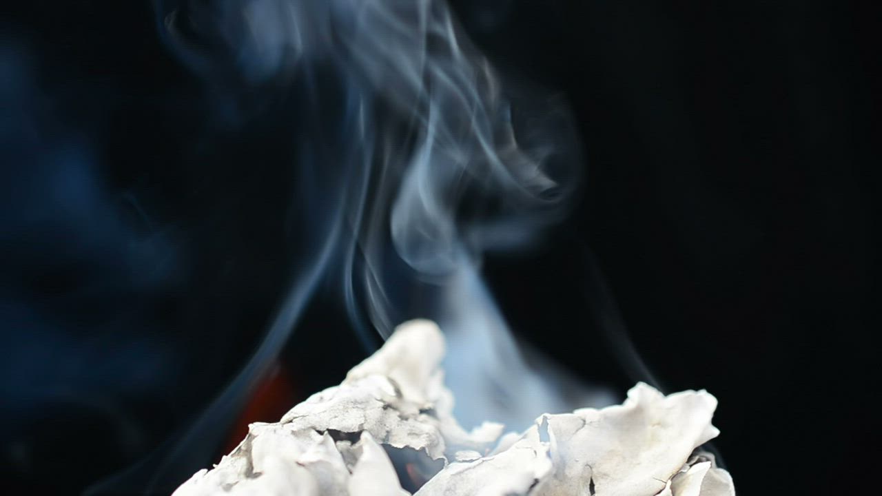 Smoking paper burning slowly - Free Stock Video
